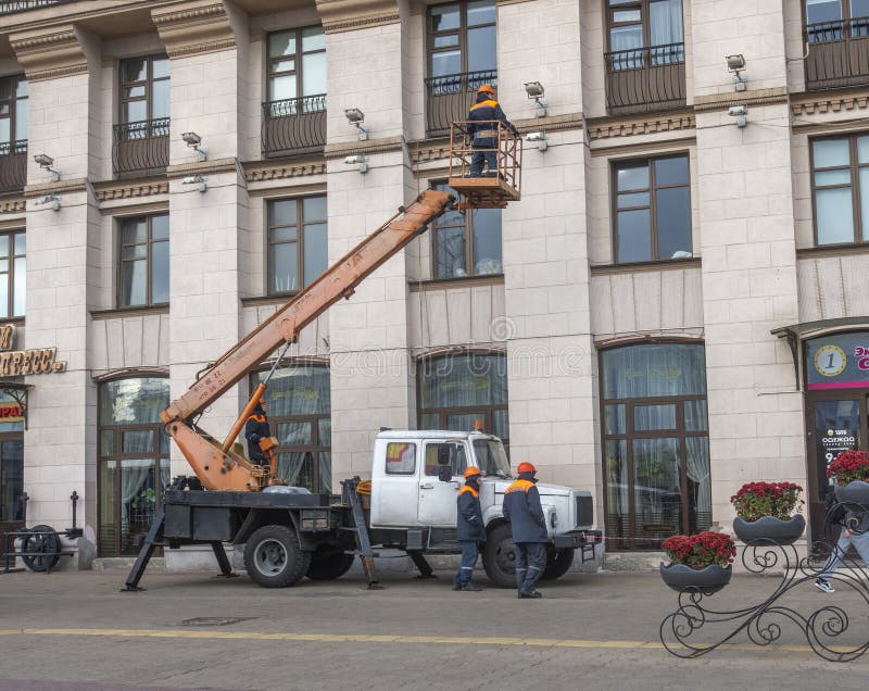 Electrical Repair Work at Height on the Facade of a Building in Minsk ...