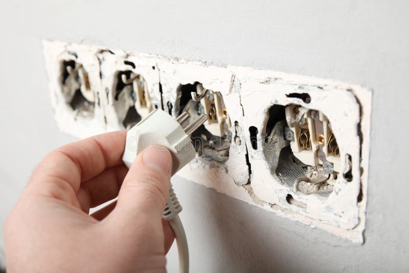 Damaged Socket in the Wall, Dangerous Electricity in the House Stock ...