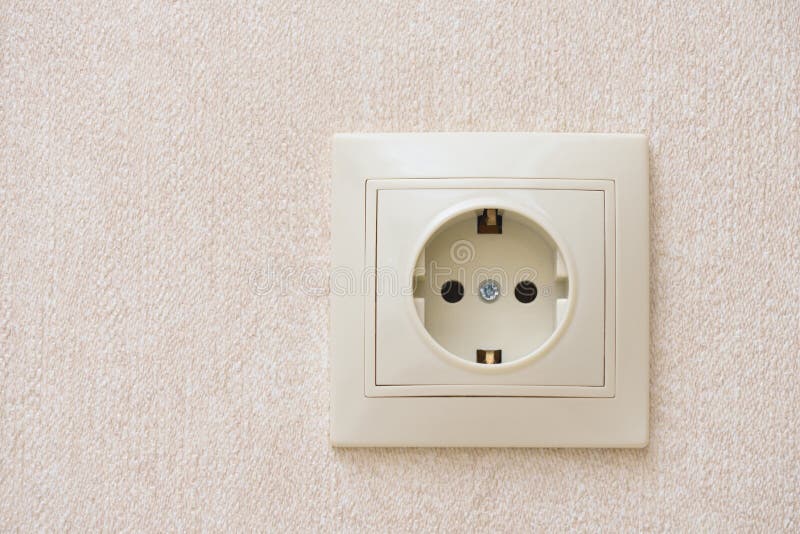 Electrical Socket in Beige Color Built into the Wall. Outlet Stock ...