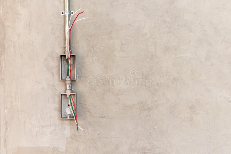 Electrical Socket Boxes with Wires on Cement Wall in a Wall Under ...