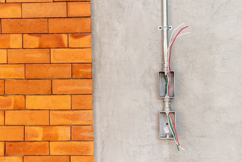 Electrical Socket Boxes with Wires on Cement Wall in a Wall Under ...