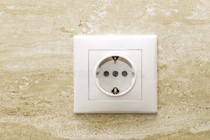 Electrical Socket on Brown Wall. European Electric Outlet.. Stock Image ...