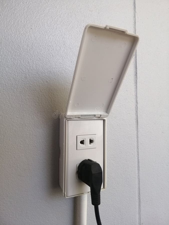 Electricity Socket Installed on White Concrete Wall, Light Switch on ...