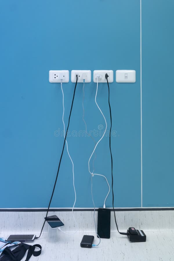 An Electrical Socket Full of Wires for Charging Stock Image - Image of ...