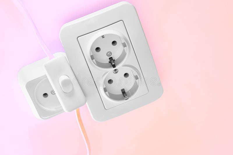 Electrical Sockets for Connecting Devices and a Switch on Pink Stock ...