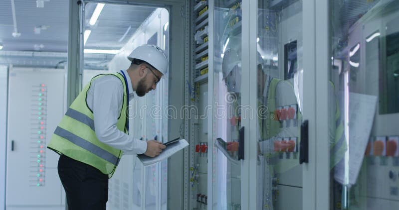 Man in Control Center of Solar Power Station Stock Video - Video of ...