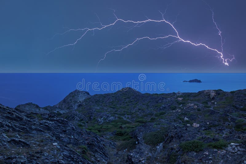 An Electrical Storm Over the Sea at Sunset Stock Photo - Image of ...