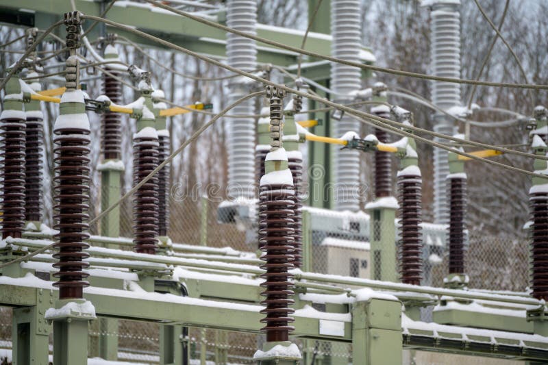 Electrical Substation Ceramic Insulators Covered with Snow Stock Image ...
