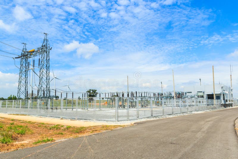 Electrical Substation with Windmill Stock Photo - Image of electric ...