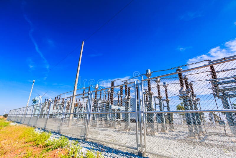Electrical Substation with Windmill Stock Photo - Image of electric ...