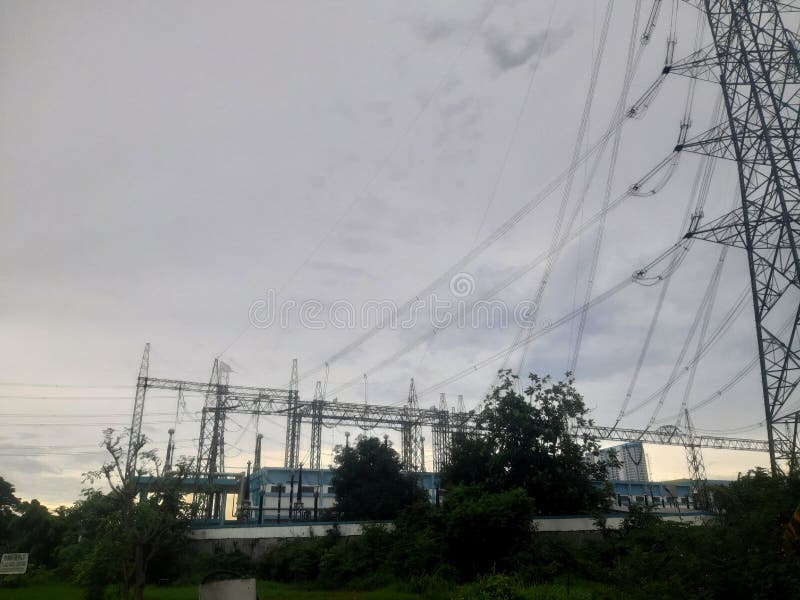 An Electrical Substation with Several Electrical Transmission Towers ...