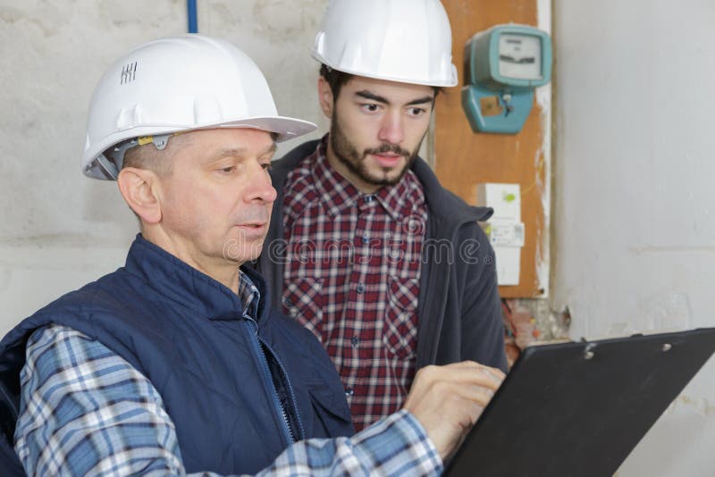 Electrical Supervisor Showing Details Stock Image - Image of vocational ...