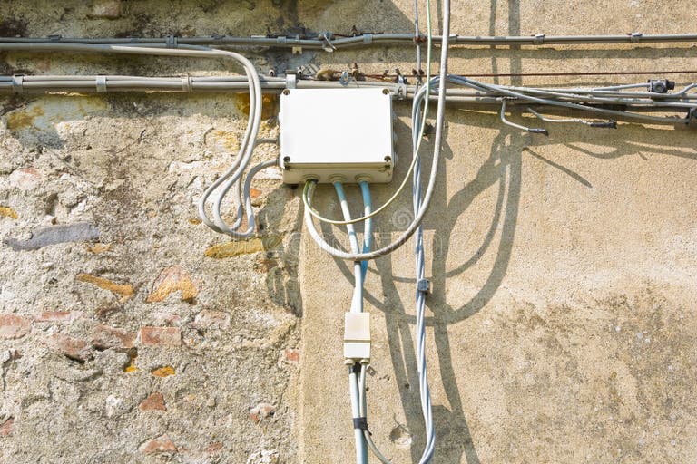 Electrical and Telephone Cables with Plastic Junction Box Against an ...