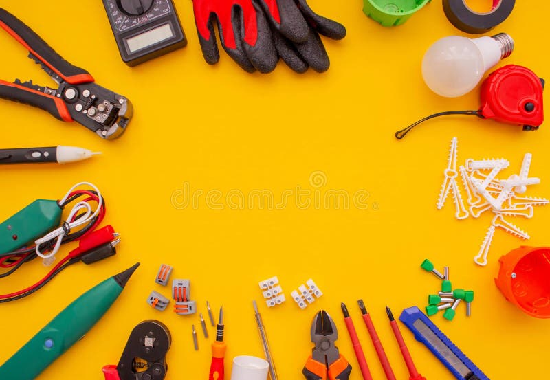 Electrical Tools and Equipment on Yellow Background Stock Photo - Image ...