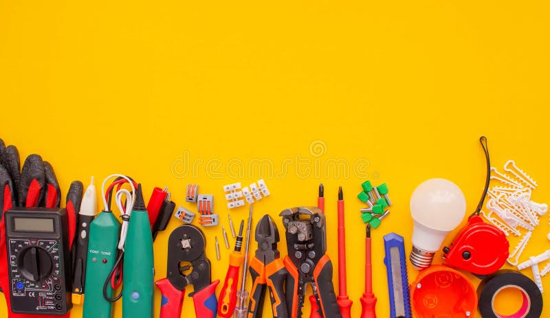 Electrical Tools and Equipment on Yellow Background Stock Photo - Image ...