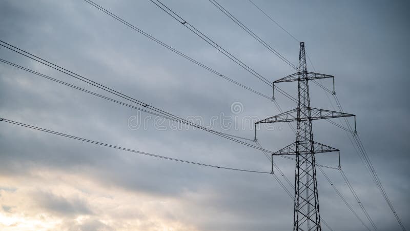 Electrical Tower Under a Cloudy Sky Stock Image - Image of electricity ...