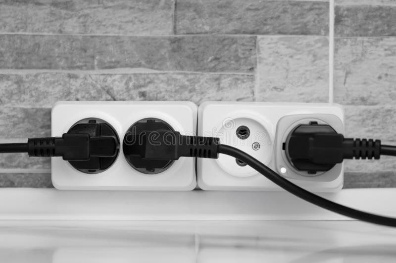 Electrical White Socket with Black Plugs Stock Photo - Image of ...