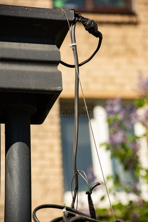 Electrical Wires Hanging with Metal Structure Stock Photo - Image of ...