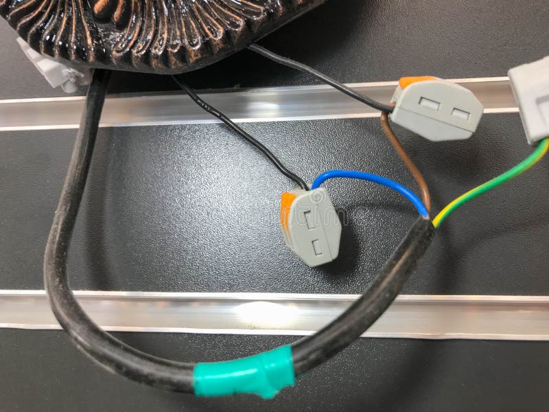 Electrical Wires in the Lamp. Wires Wrapped with Electrical Tape at the ...