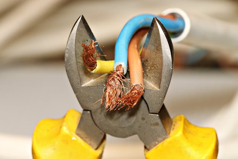Electrical Wires in the Process of Being Cut with a Side Cutter. Stock ...