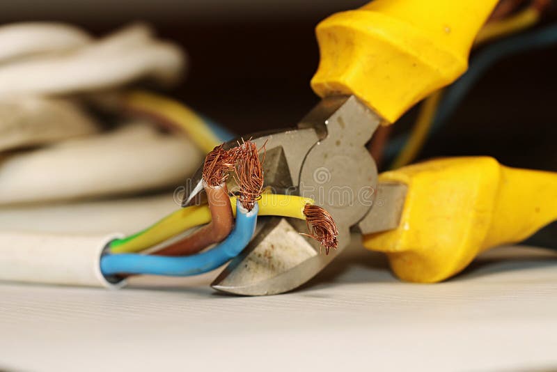 Electrical Wires in the Process of Being Cut with a Side Cutter. Stock ...
