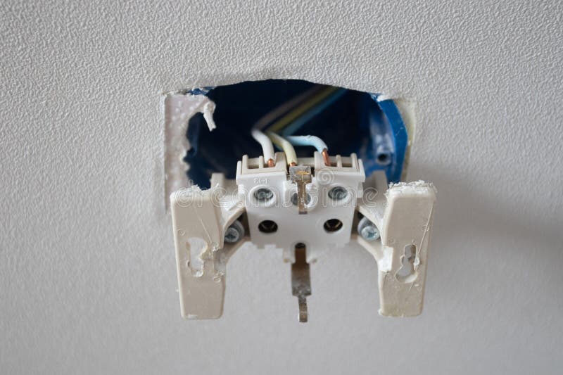 Electrical Wires Sticking Out from Electrical Socket Hole Stock Photo ...