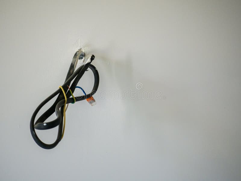 Electrical Wires Sticking Out of the Wall To Connect the Lamp. Stock ...