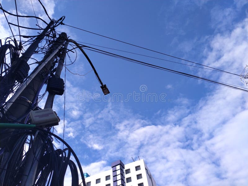 Electrical Wires and Telephone Lines are Installed on the Power Poles ...