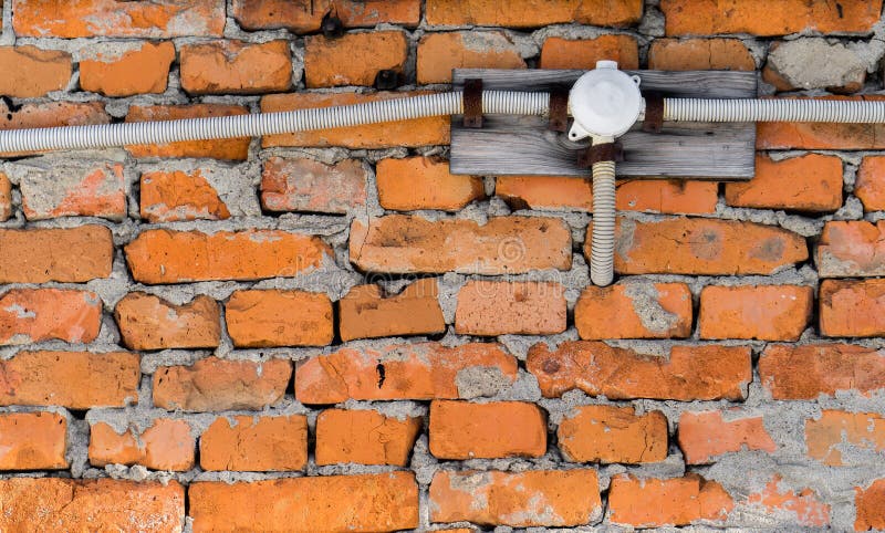 Electrical Wiring on a Brick Wall Stock Image - Image of electricity ...