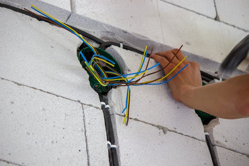 Electrical Wiring of the House, Cable on the Wall in the Gate. Stock ...