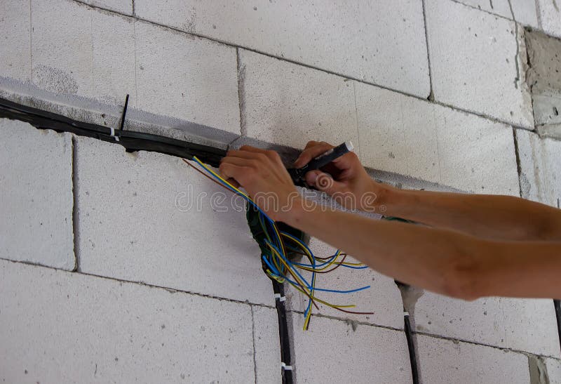 Electrical Wiring of the House, Cable on the Wall in the Gate. Stock ...