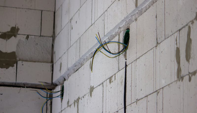 Electrical Wiring of the House, Cable on the Wall in the Gate. Stock ...