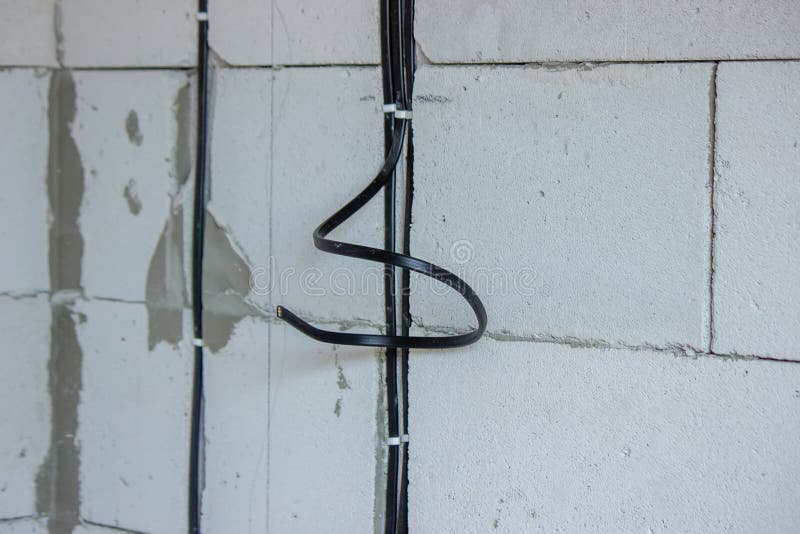 Electrical Wiring of the House, Cable on the Wall in the Gate. Stock ...