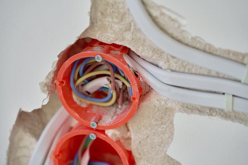 Electrical Wiring Installation with Exposed Wires and Wall Sockets ...
