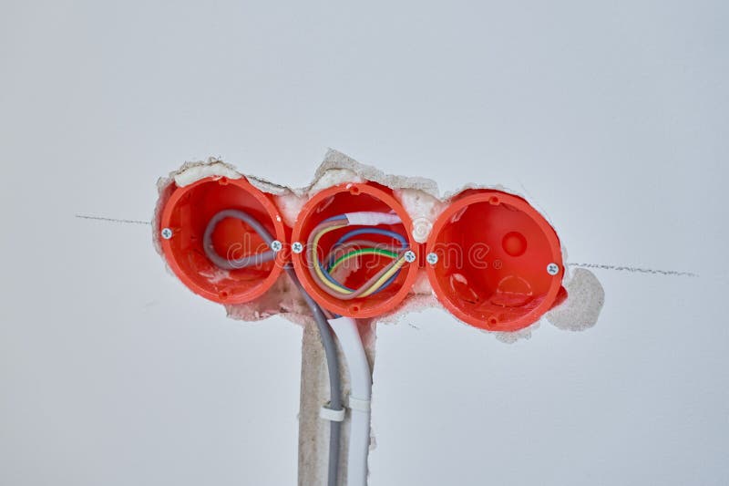 Electrical Wiring Installation with Exposed Wires and Wall Sockets ...