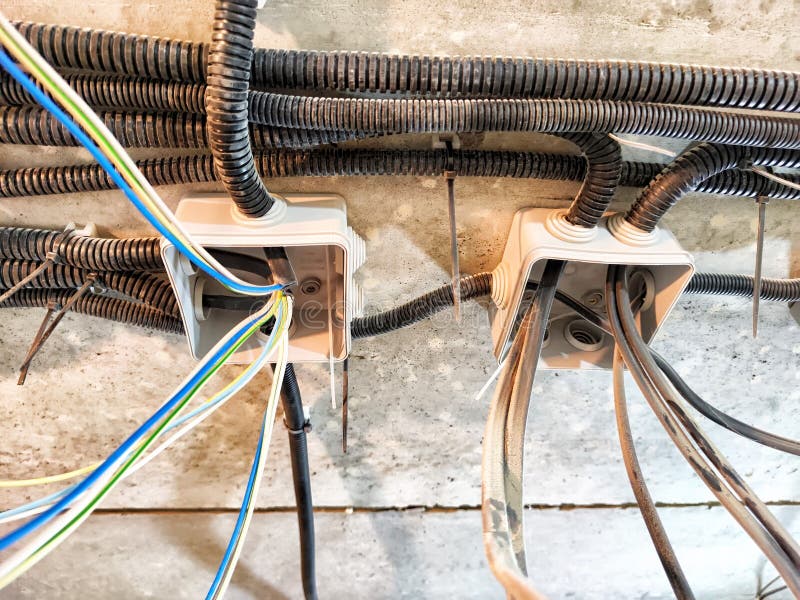 Electrical Wiring Junction Boxes Mounted on a Concrete Wall with ...