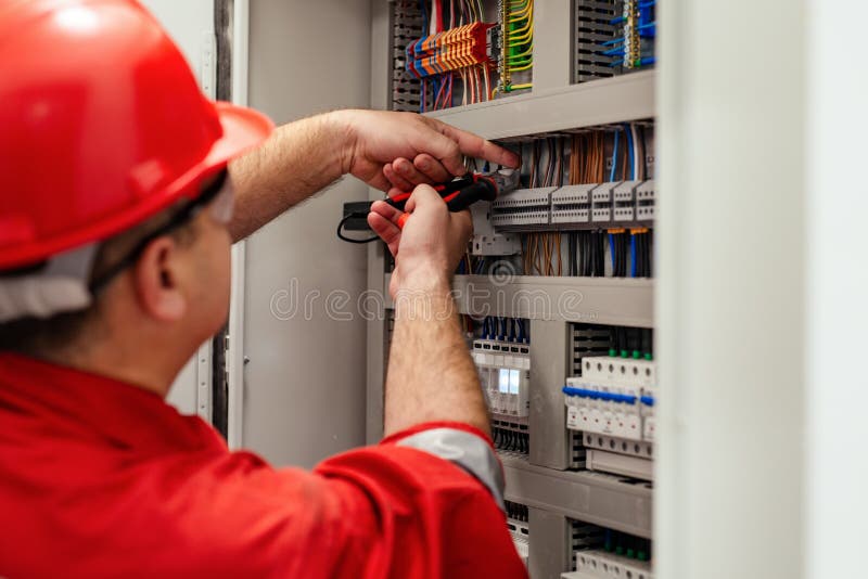 Electrical Wiring Repair. Repairman Repairs Electrical Panel Stock ...