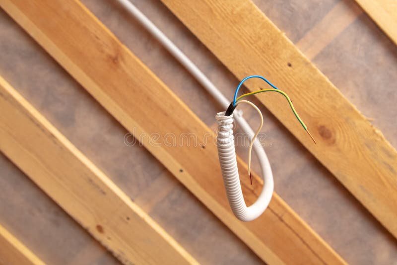 Electrical Wiring on the Wall of Stone Bricks. Stock Photo - Image of ...