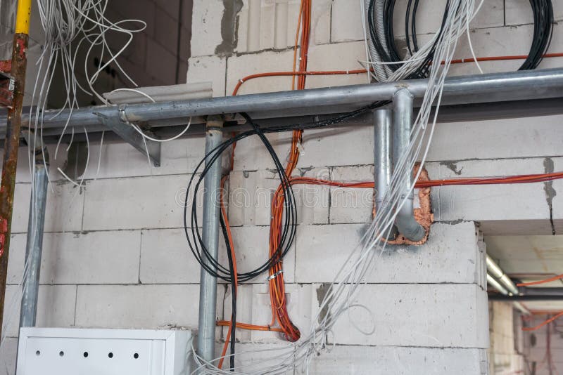 Electrical Wiring Work at a Construction Site. Wire Extension. Stock ...