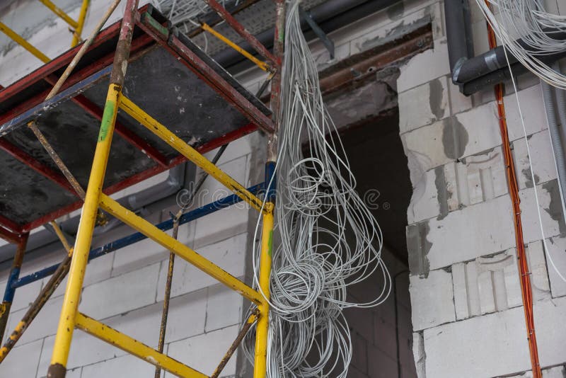 Electrical Wiring Work at a Construction Site. Wire Extension. Stock ...