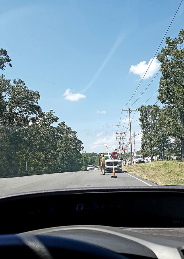 Electrical Work on Overhead High Voltage Electrical Wire Stock Photo ...