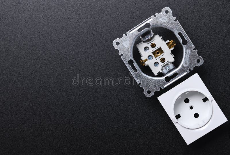 Electrical Work & Repair Costs.Disassembled Socket on a Black ...