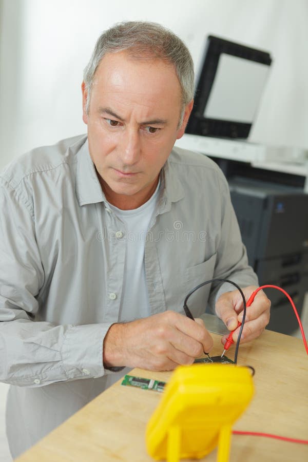 Electrical Worker Checks High Voltage Cable Stock Photo - Image of ... Electrical Worker Checks High Voltage Cable Stock Photo - Image of ...