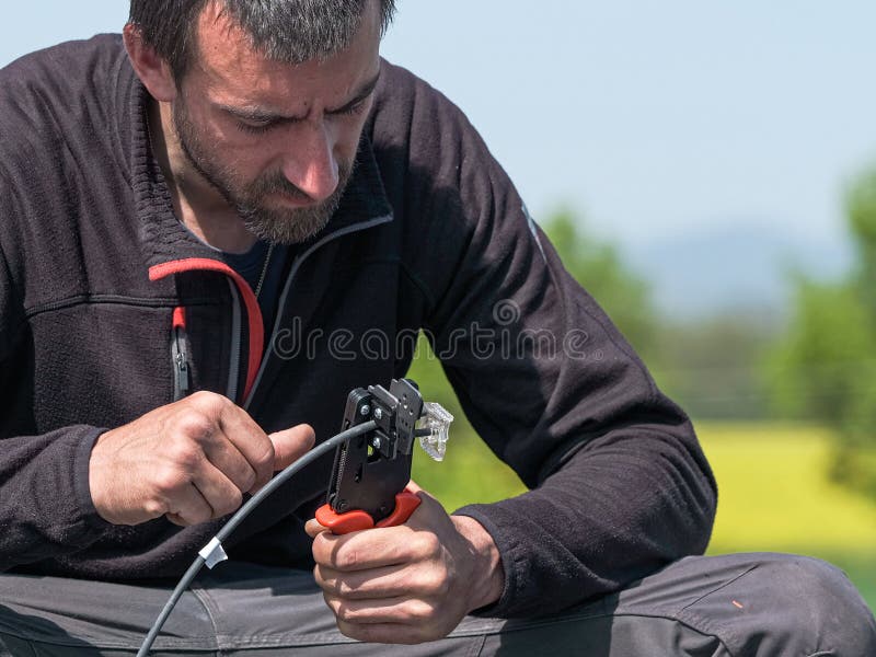 Electrical Worker Preparing Electrical Connection Cables for Solar ...