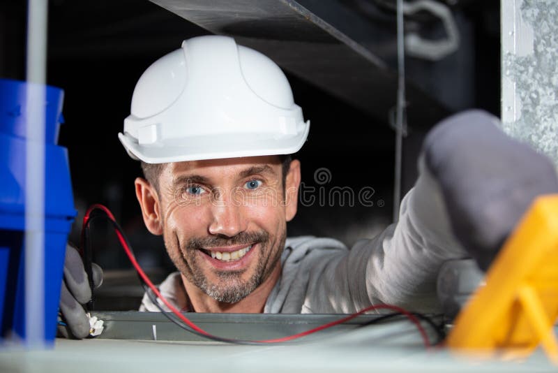 Electrical Worker Wiring in Ceiling Stock Photo - Image of tool ...
