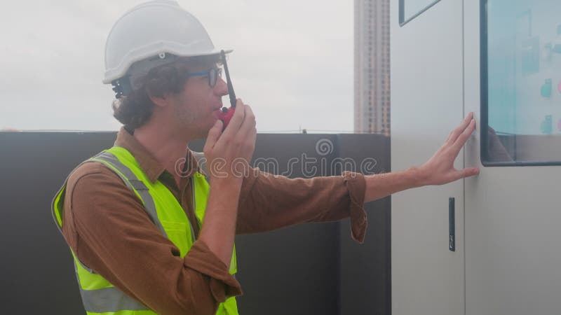 Electrical Young Man Engineer Examining Maintenance Cabinet System ...