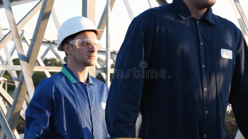 An Electrician or Builder and Engineer, in a Blue Robe, in a Yellow and ...