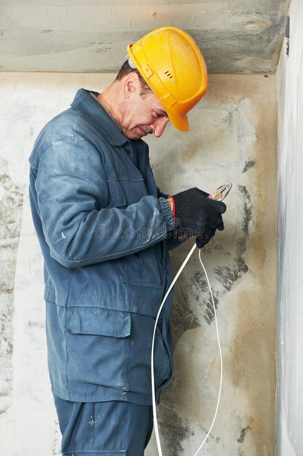 Electrician at Cable Wiring Work Stock Photo - Image of craftsman ...