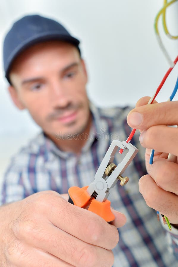 Electrician with Cables on Hand Standing Stock Photo - Image of ...