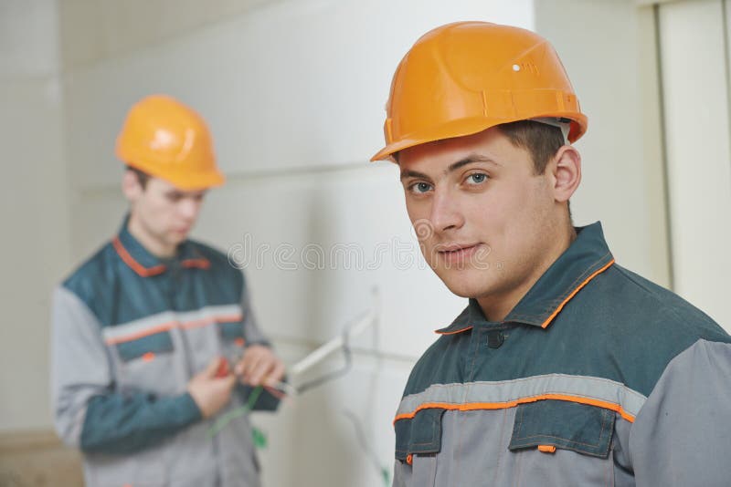 Electrician. Cabling work stock image. Image of cable - 43814357